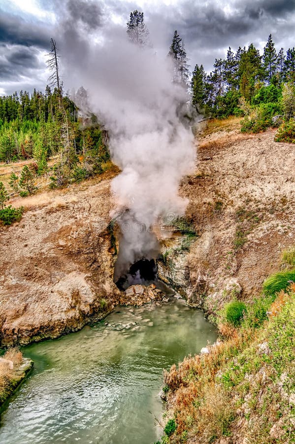 Hot Spring and Geiser in Yellowstone National Par Stock Photo - Image ...