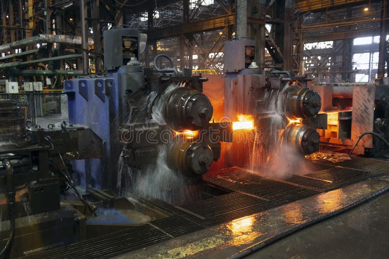 Hot Steel on Conveyor in a Steel Mill. Hot Rolled Rebar Stock Image ...