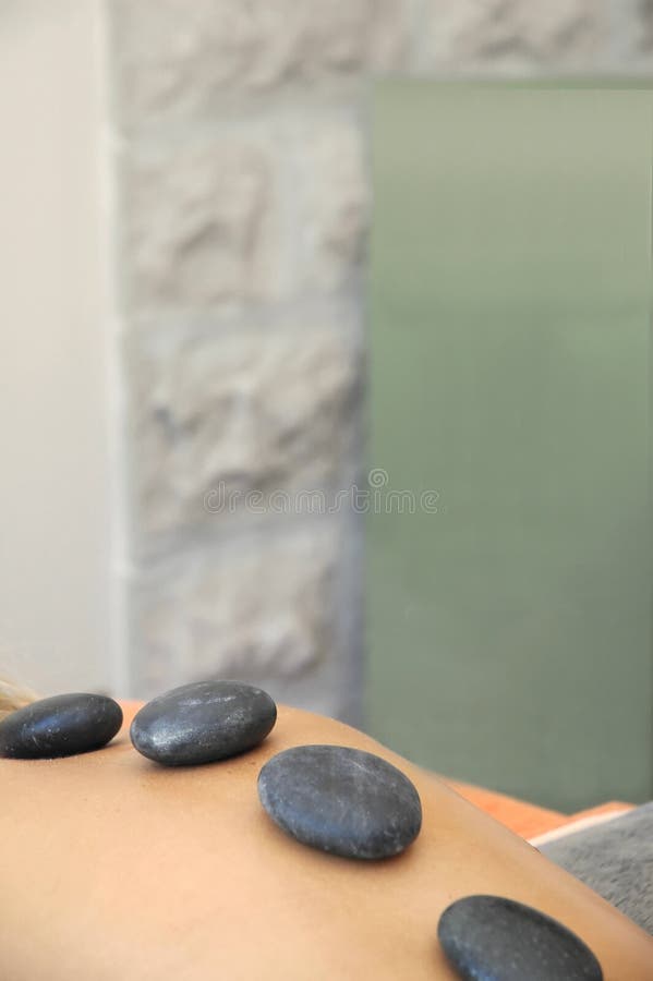 Hot stones massage stock photo. Image of body, skincare - 2702316