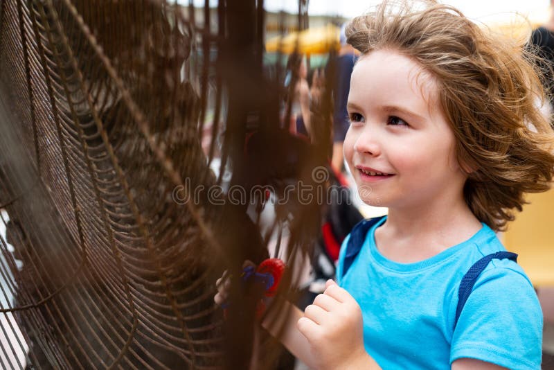 Hot Summer. the Child Enjoys the Wind from the Cooler. Freshness and ...