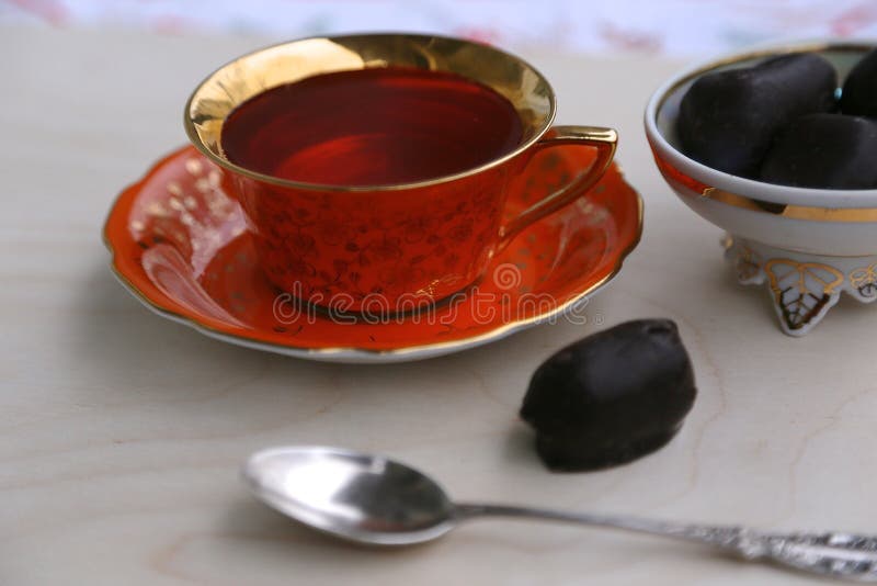 Hot Tea Cup and Chocolate Candy Stock Photo - Image of view, tooth ...