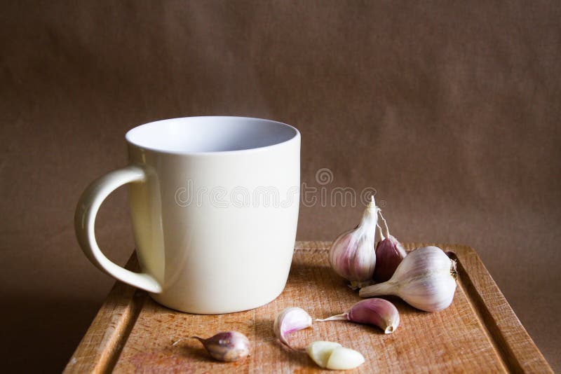 Hot tea and garlic stock photo. Image of health, cutting - 86016352