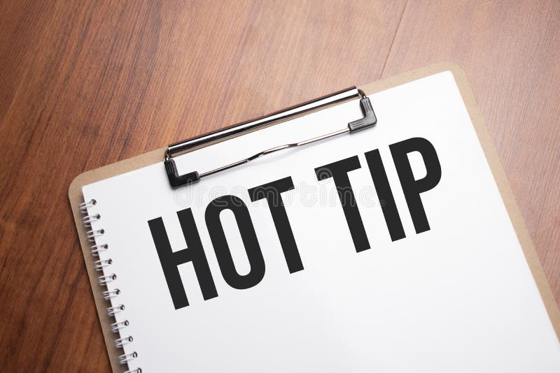 Hot Tip Text on White Paper on the Wood Table Stock Image - Image of ...