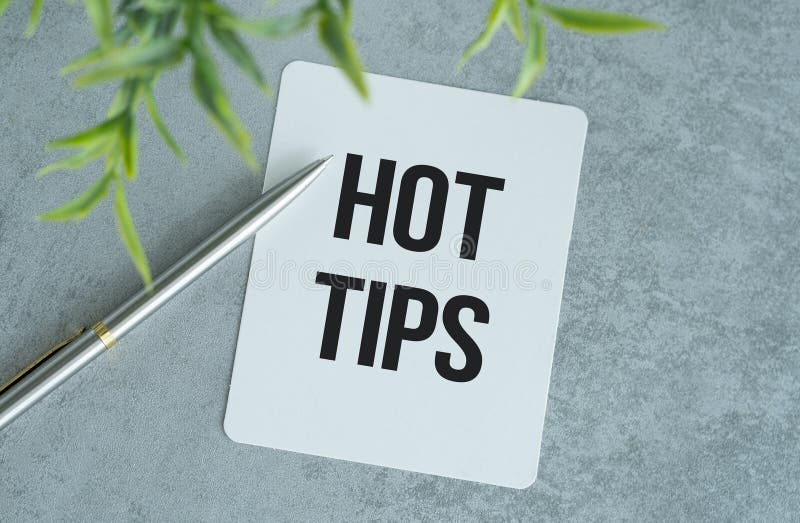 Hot Tip Text on White Paper on the Wood Table Stock Photo - Image of ...