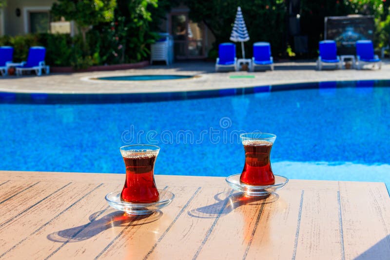 Hot Turkish Tea on a Table Near Swimming Pool Stock Photo - Image of ...