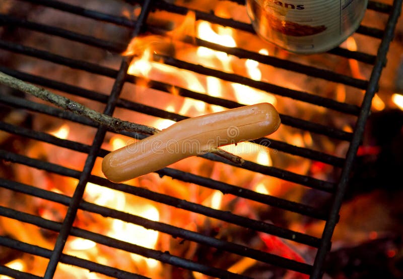Hotdog over fire stock image. Image of flame, cooking - 17915695
