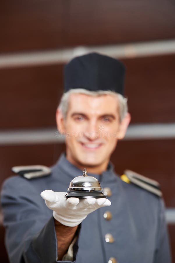 Hand with hotel bell stock photo. Image of person, lobby - 31650118