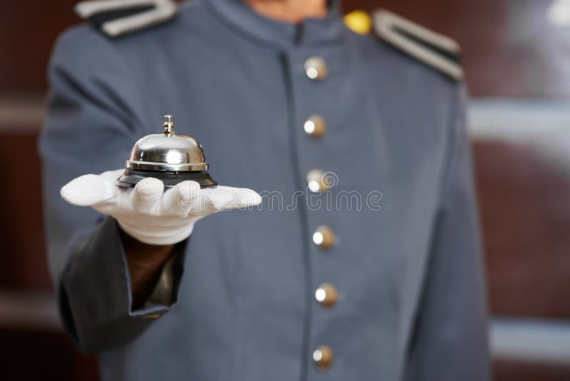 Hand with hotel bell stock photo. Image of person, lobby - 31650118