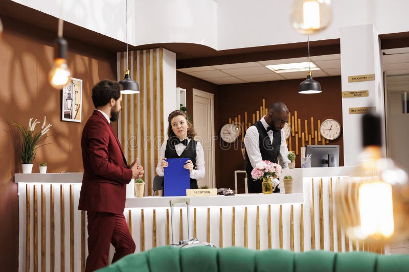 Hotel Concierge Greet Client Stock Image - Image of client, stay: 301720269