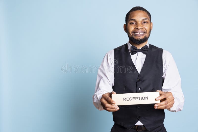Hotel Concierge Presenting the Reception Indicator Mark at Front Desk ...