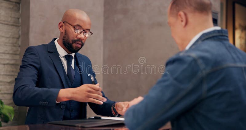 Hotel, Employee and Guest at Reception for Check in, Hospitality and ...