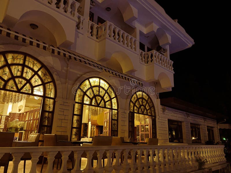 Hotel in the Evening. a Whitewashed, Tall, Multistory Building with ...