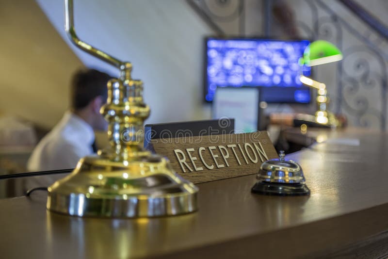 Hotel Front Desk with Focus on Reception Sign Stock Image - Image of ...