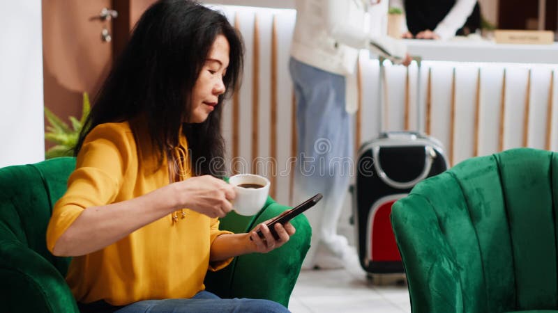 Hotel Guest Waiting for Check in Process at Hotel Stock Video - Video ...