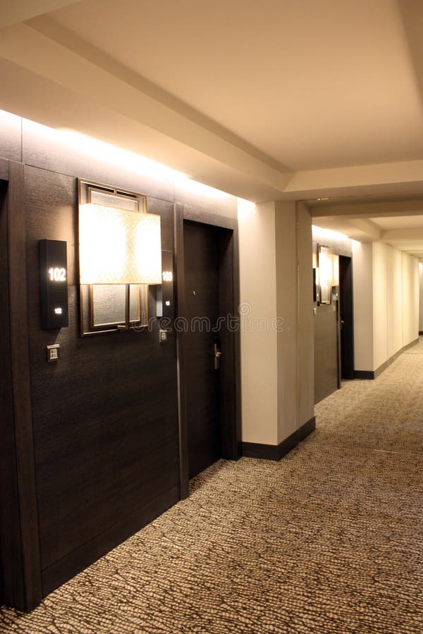 Hotel interior hallway stock image. Image of lighting - 64788525