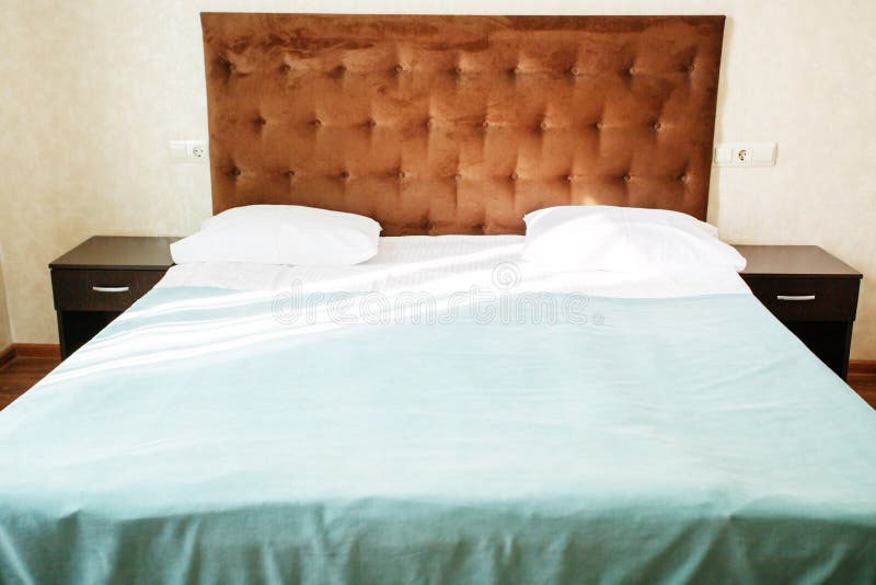 Hotel Interior, Room with Bed and Bedside Table in Motel Stock Photo ...