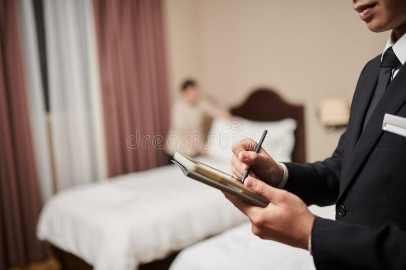 Hotel Manager Checking Document on Tablet Stock Image - Image of maid ...