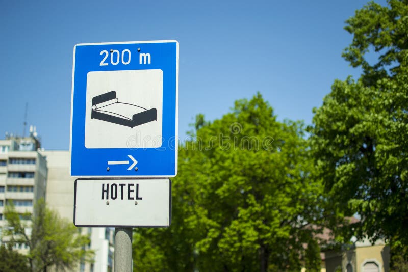 Hotel 200 metres stock image. Image of hotel, sign, tree - 53343741