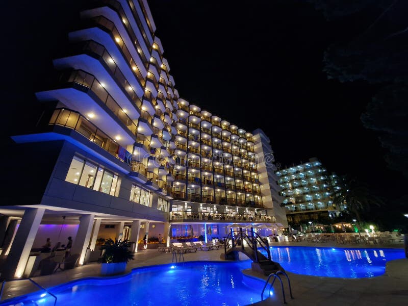 Hotel by night stock photo. Image of downtown, reflection - 265668540