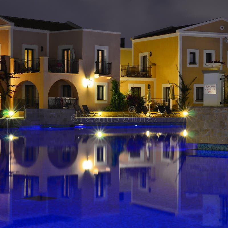 Hotel Pool Area in the Evening Stock Image - Image of resort ...