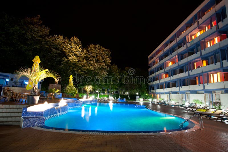 Hotel pool at night stock image. Image of colorful, night - 15817247