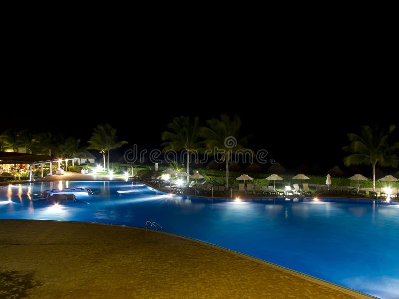 Hotel pool at night stock photo. Image of illuminate - 21850494
