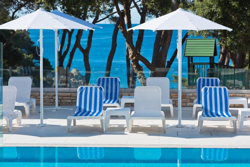 Hotel Poolside Chairs with Sea View Stock Image - Image of location ...
