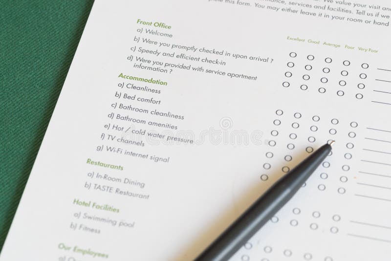 Hotel Questionnaire Form with Pen Stock Photo - Image of document ...
