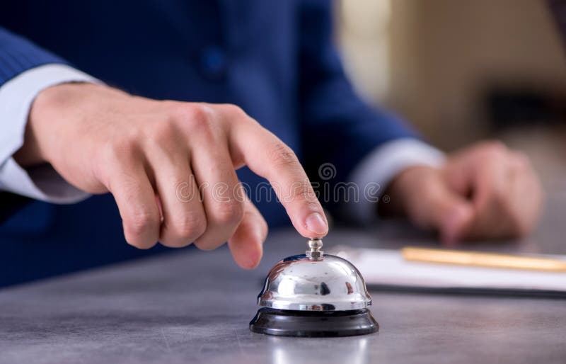 Hotel Reception Bell at the Counter Stock Photo - Image of employee ...