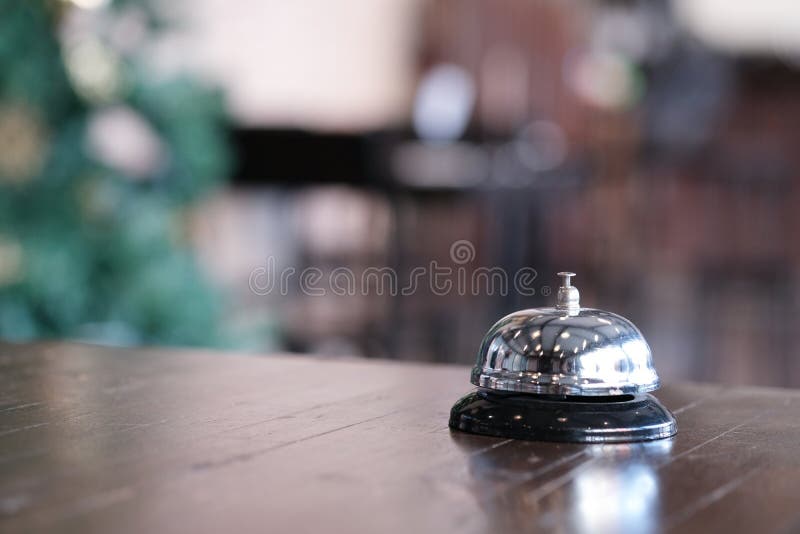 Hotel Reception Counter Desk with Service Bell Stock Photo - Image of ...