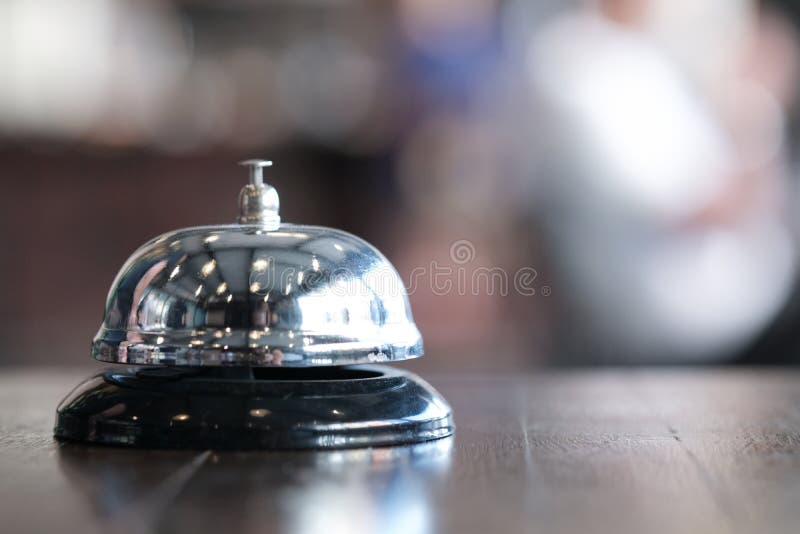 Hotel Reception Counter Desk with Service Bell Stock Photo - Image of ...
