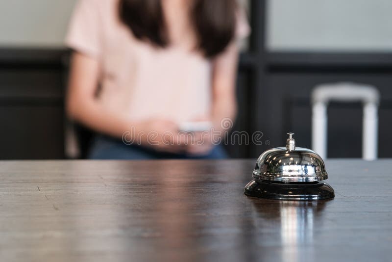 Hotel Reception Counter Desk with Service Bell Stock Image - Image of ...