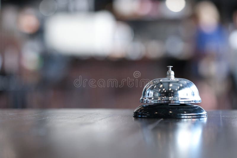 Hotel Reception Counter Desk with Service Bell Stock Photo - Image of ...