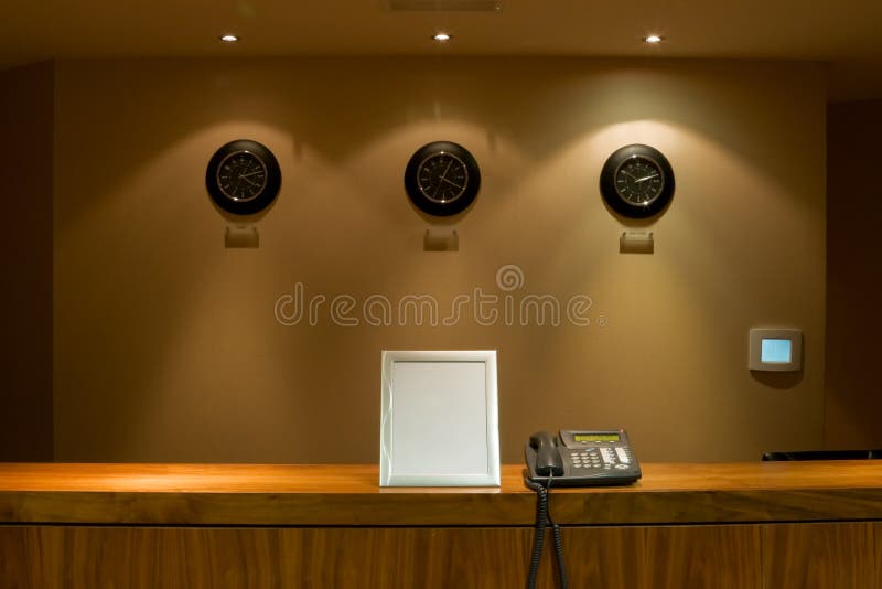Hotel Reception Desk with Phone and Signboard Stock Image - Image of ...