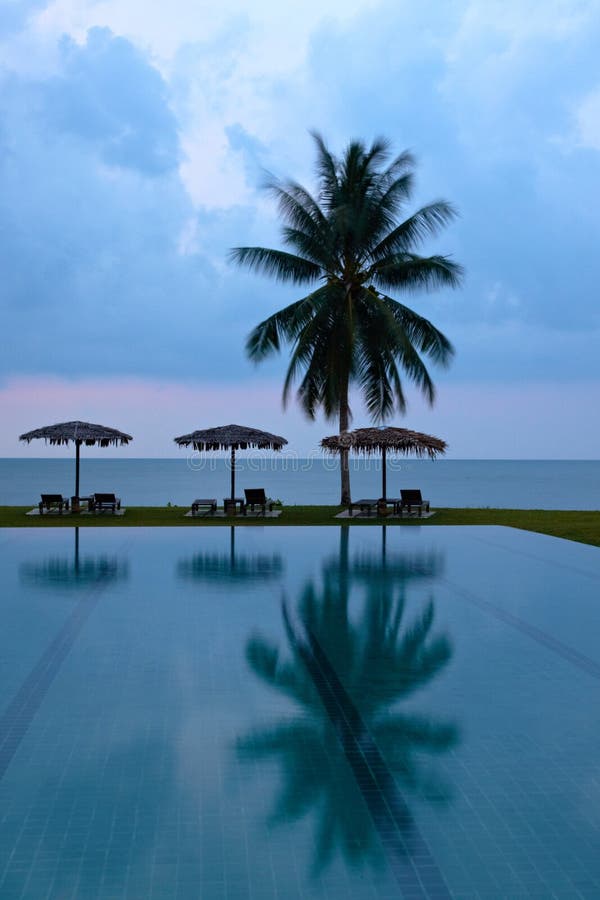 A Hotel or Resort Pool at Sunset Stock Photo - Image of luxury ...