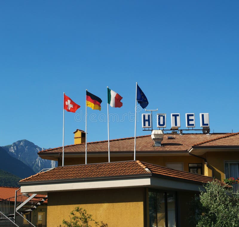 Hotel roof with flags stock image. Image of national - 10336699
