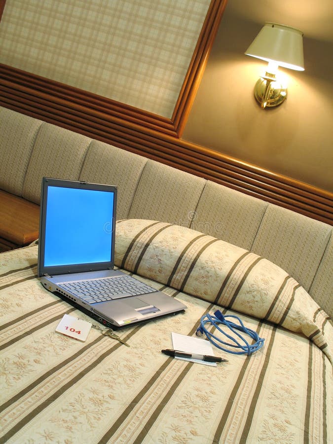 Hotel room - 2 stock photo. Image of laptop, floral, bedcover - 2210628