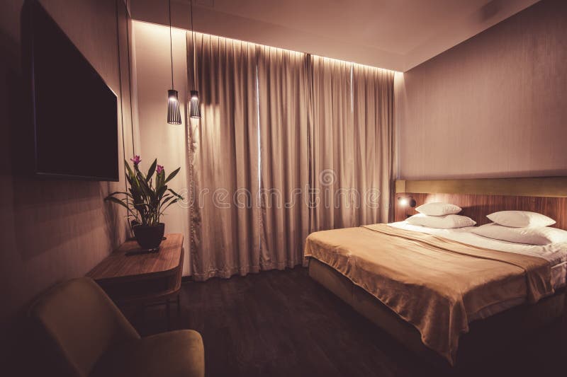 Hotel Room with Closed Curtains at Night Stock Photo - Image of maid ...