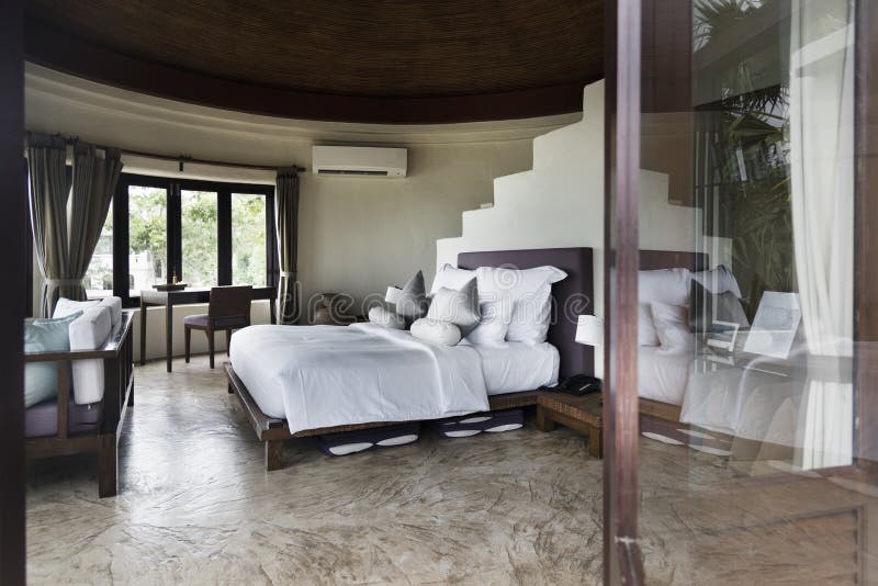 Hotel Room at a Luxury Resort Stock Image - Image of luxurious, bedroom ...