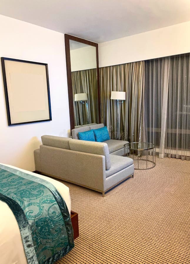 Hotel Room - sofa area stock image. Image of comfortable - 306766873