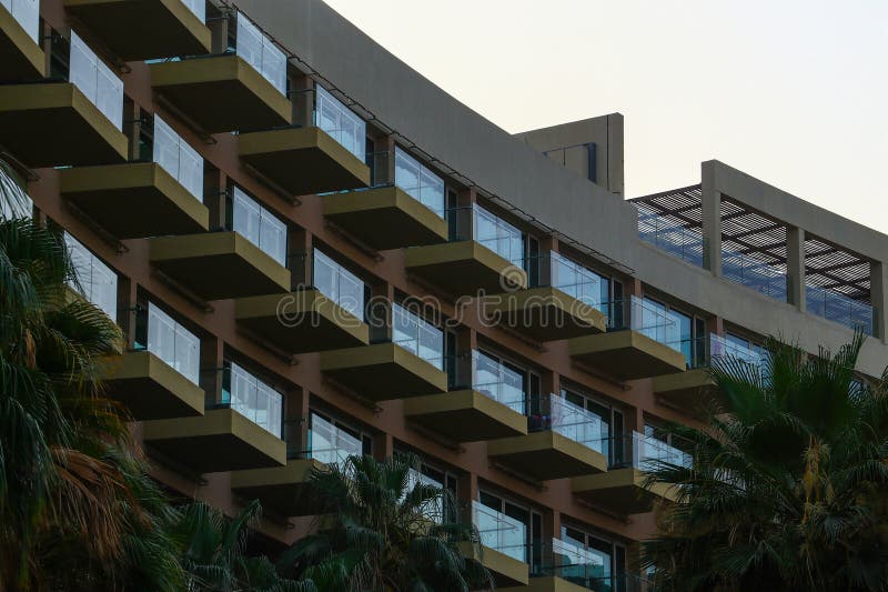 The Hotel S Rows of Glass Balconies Create an Interesting Pattern As ...