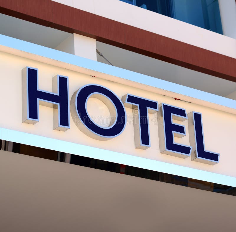 A hotel sign stock photo. Image of modern, signage, wall - 151732796
