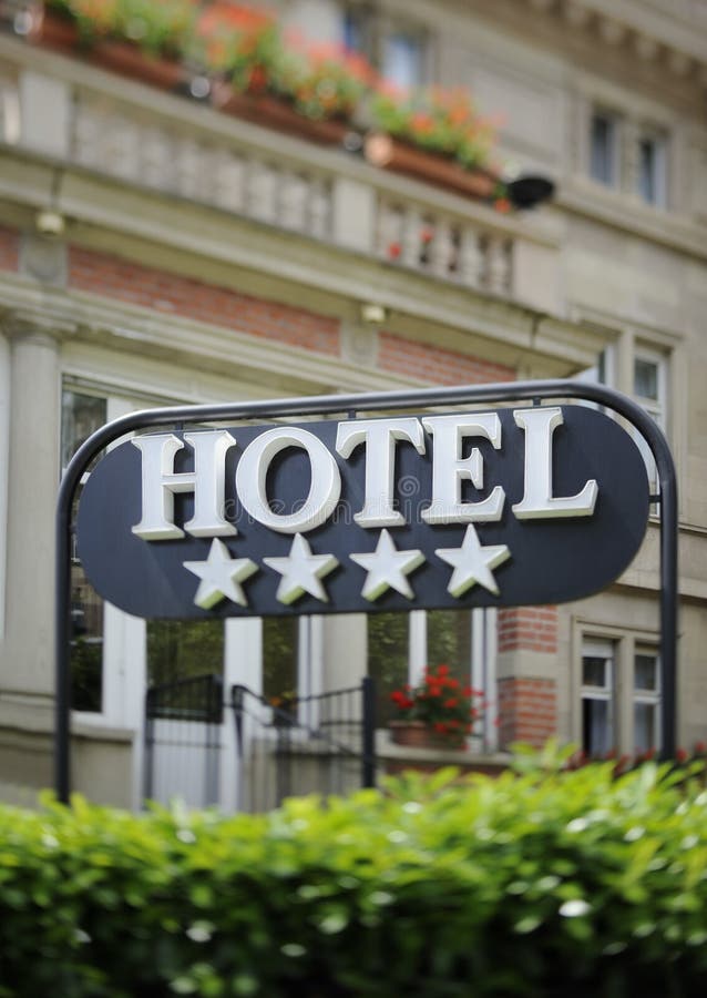 Hotel sign stock image. Image of evening, city, travel - 27516625