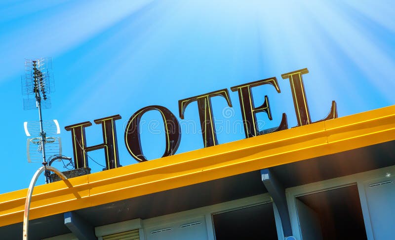 Hotel Sign Board on Building Against Blue Sky Stock Image - Image of ...