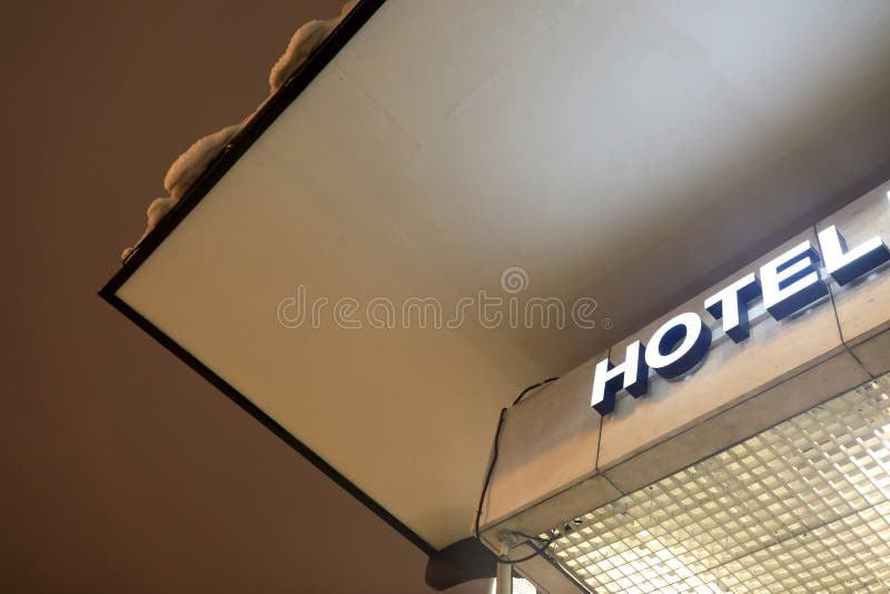 Hotel sign board at night stock photo. Image of commercial - 240971654
