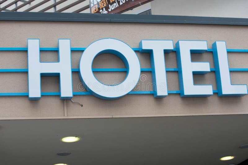 A hotel sign in tourism stock photo. Image of grand - 208234358