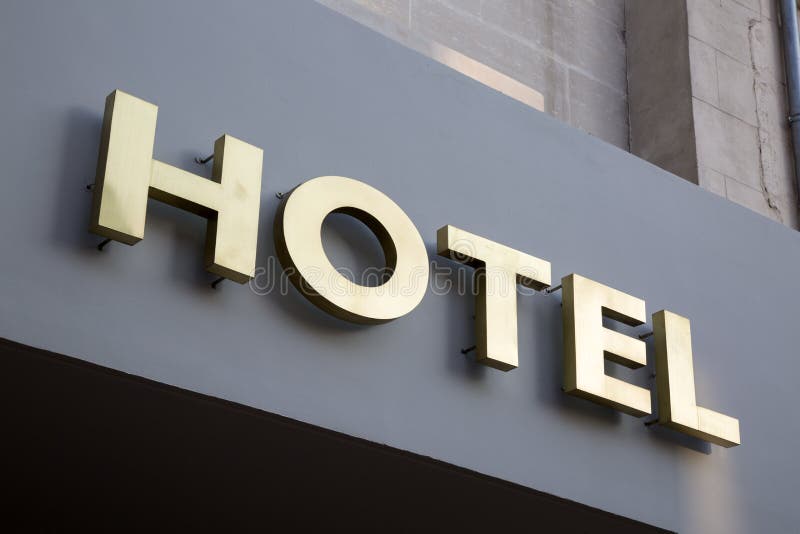 Hotel Sign stock photo. Image of tilt, hotel, gold, diagonal - 87892148