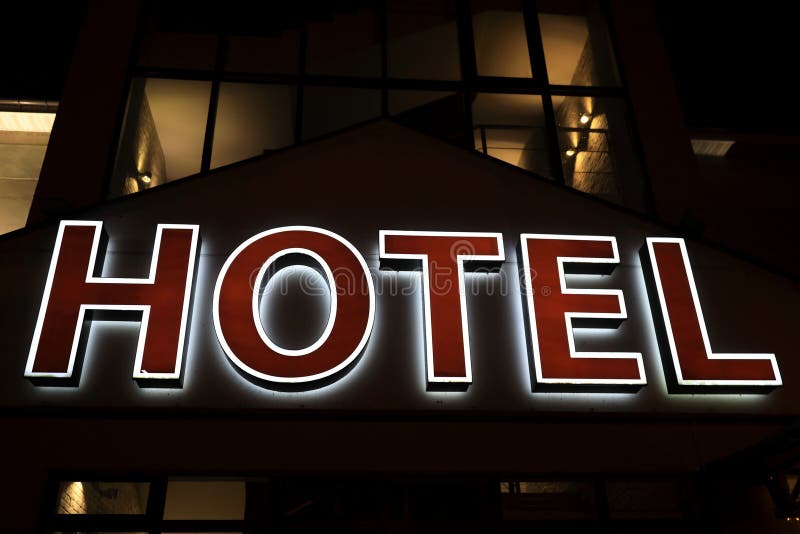 Hotel sign at night stock image. Image of decorative - 131325887