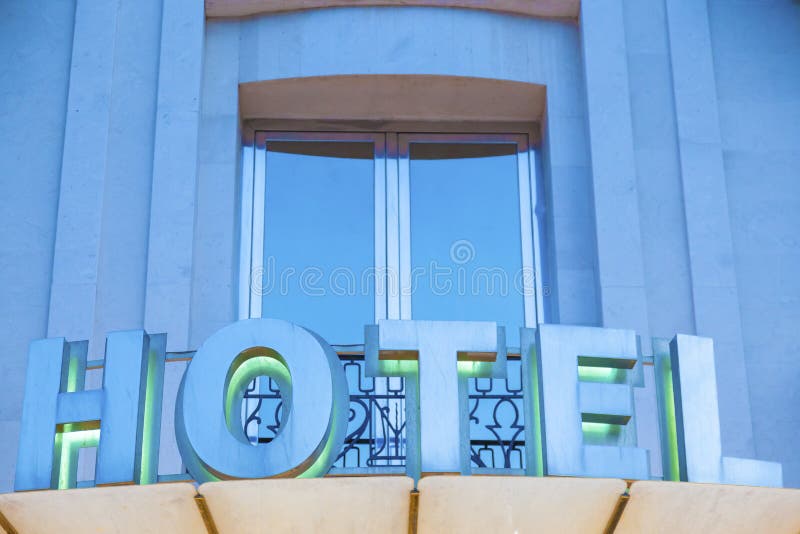 Hotel sign at night stock image. Image of night, illuminated - 96841261
