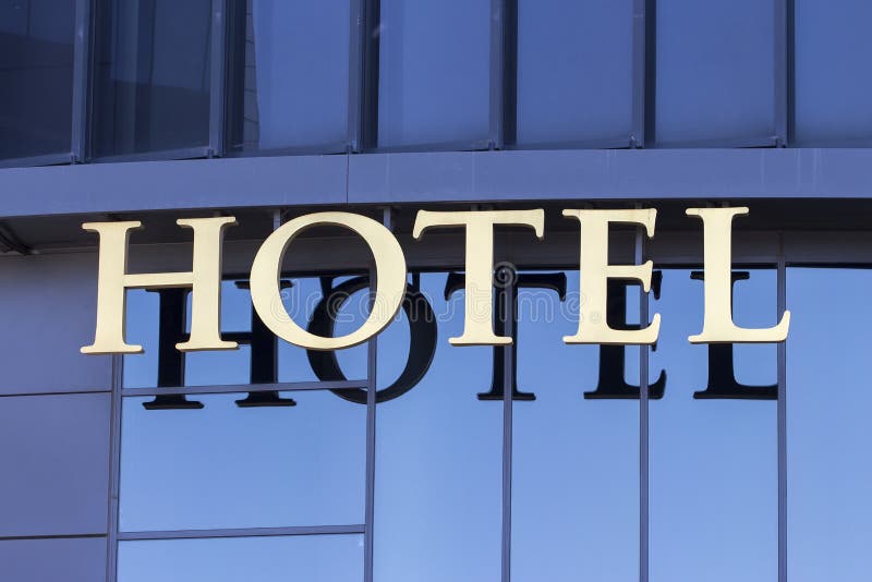 Hotel sign stock photo. Image of sign, blue, glass, hotel - 31218854